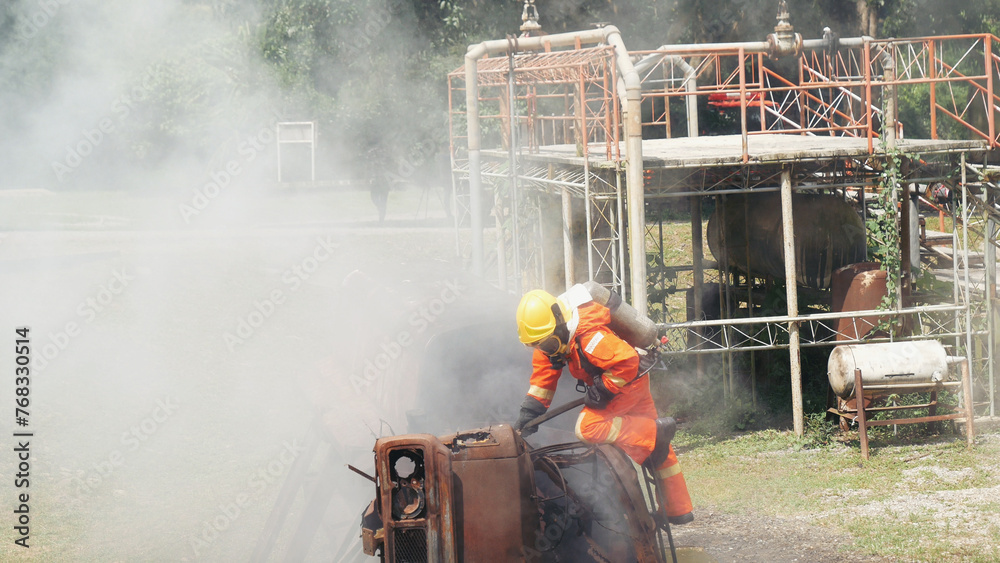 Firefighter fighting smoke flame use fire hose chemical water foam ...