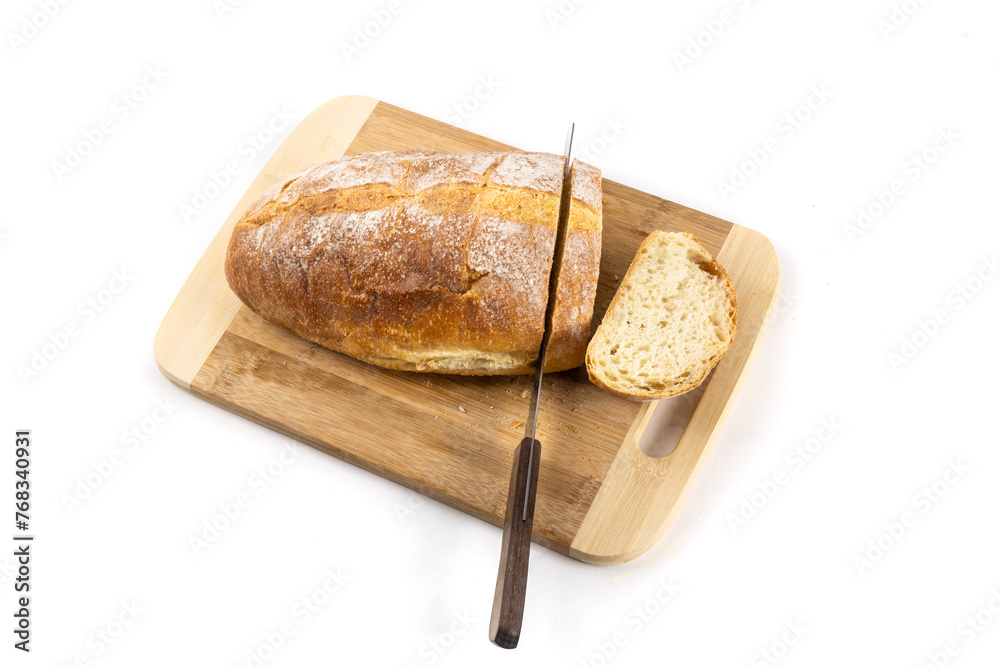 Overhead top down view of a loaf of crusty bread with the heel end cut ...