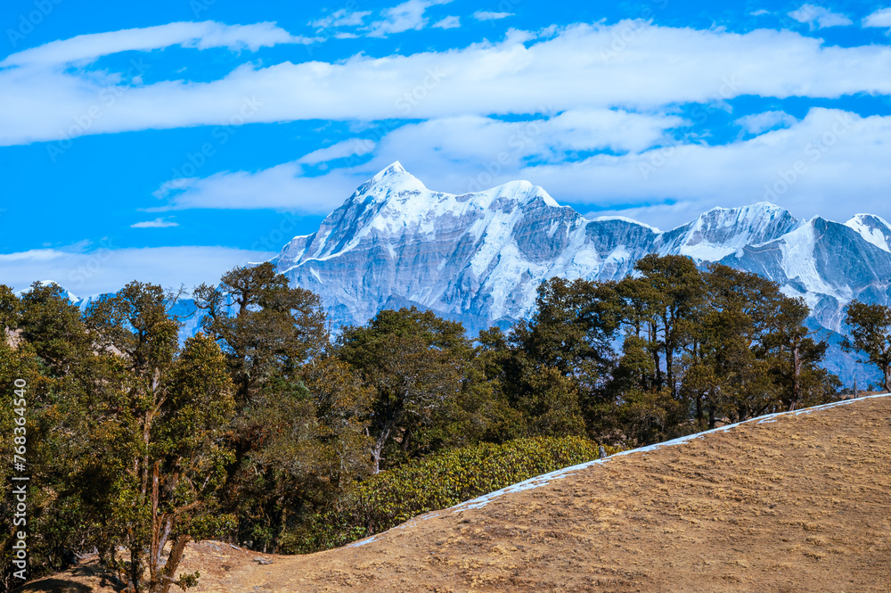 Landscape with blue sky. Scenic mystic view of Himalayan peaks such as ...