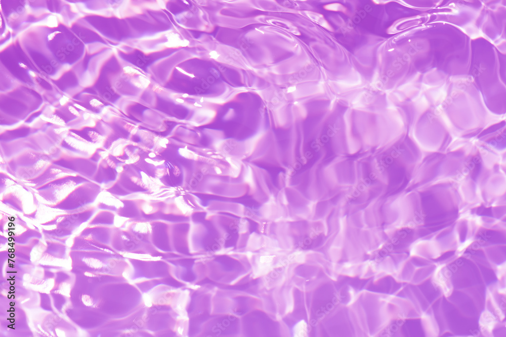 Purple water bubbles on the surface ripples. Defocus blurred ...