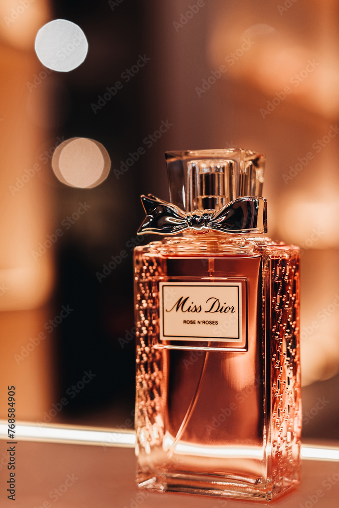Miss Dior luxury perfume glass bottle of on a stand. It was founded in ...