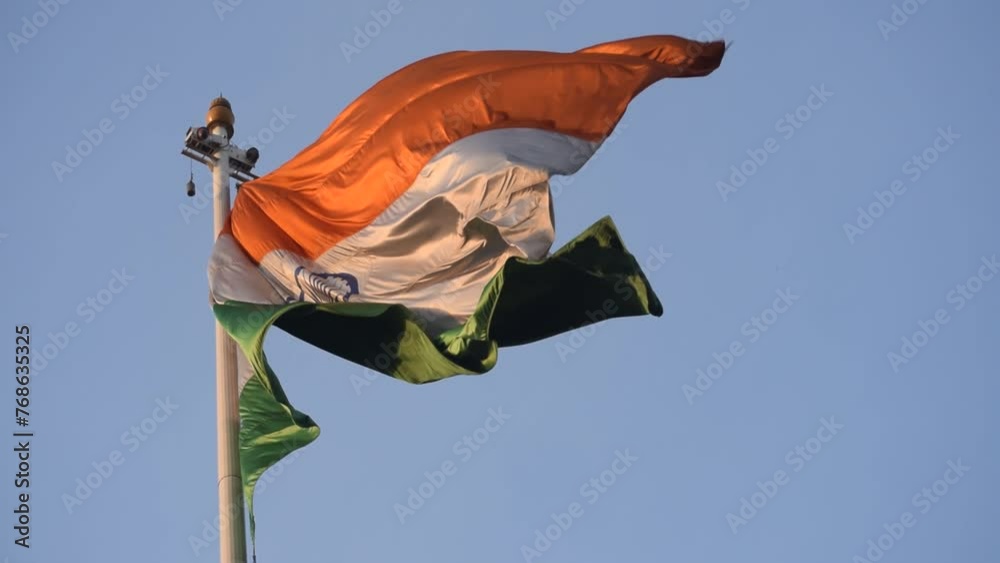 India flag flying high at Connaught Place with pride in blue sky, India ...