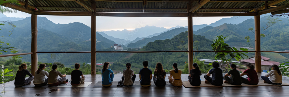Zen gathering on the wooden floor. A group of people, including a guru ...