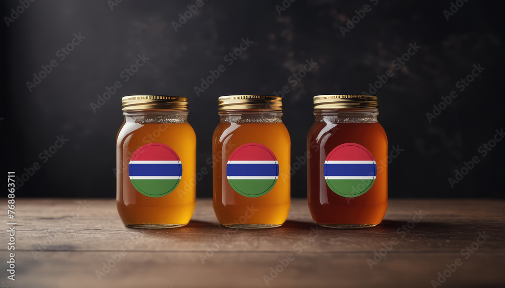 Collection of jars of different types of honey with flag Gambia ... Collection of jars of different types of honey with flag Gambia ...