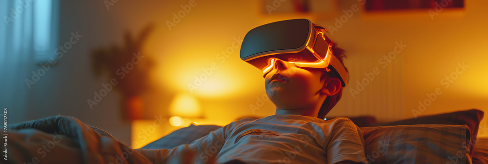 little boy with VR glasses. Boy wearing VR goggles. Using modern ...