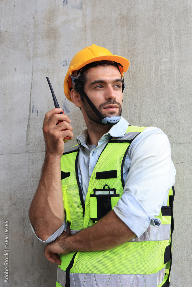 The gesture of a male engineer posing with a walkie-talkie. Strike a ...