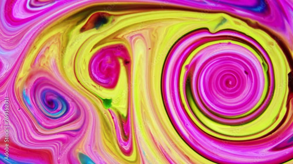 This stock video features added to liquid coloring, resulting to a ...
