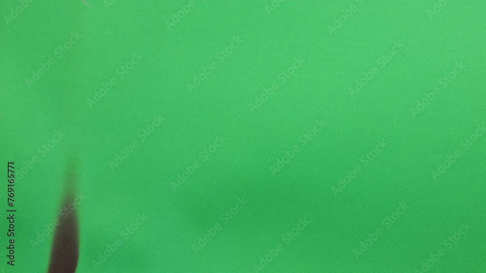 Burning green screen 4K revealing black background Easy to matte ...