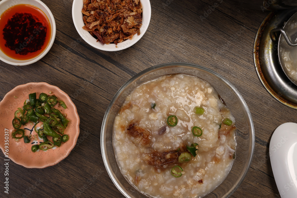 Asian thick rice porridge bubur chicken beef meat fish prawn rustic ...