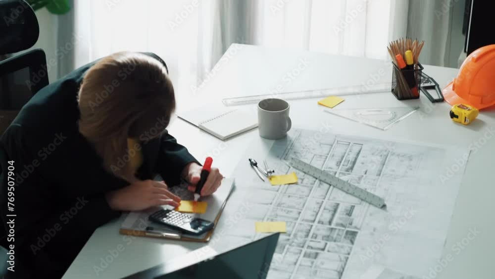 Top view of smart civil engineer drawing and measuring blueprint by ...