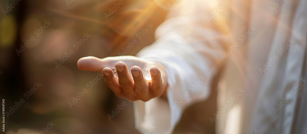 Easter religion,Jesus reaching out his hand against dark background ...