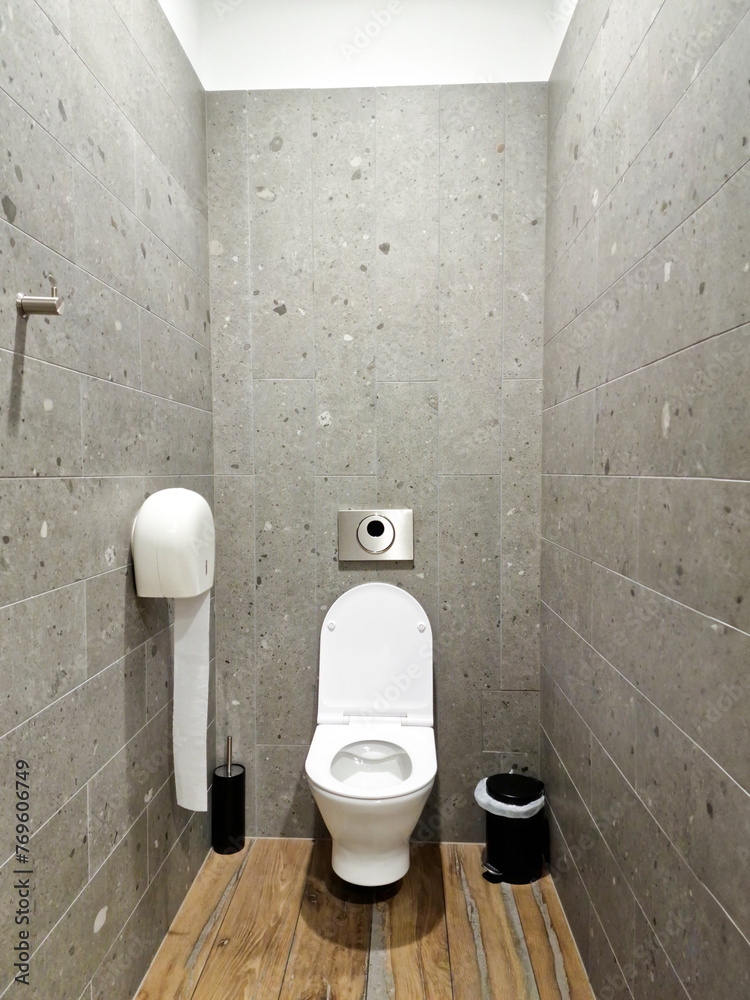 Contemporary interior of empty public restroom. Open toilet bowl, wc ...