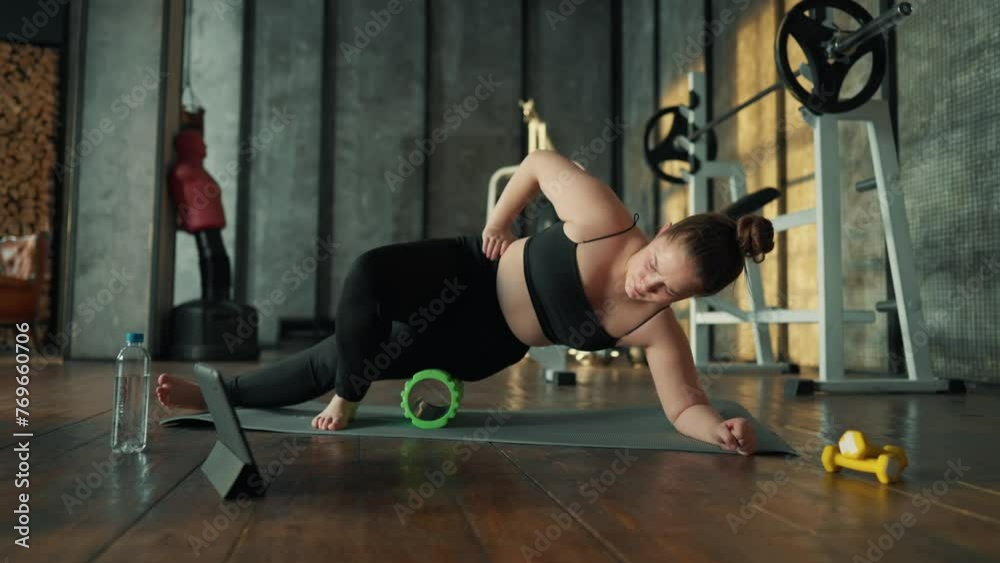 Plus size woman practice pilates. Overweight female getting yoga ...