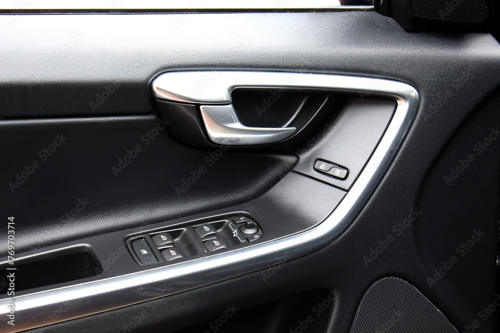 Window control buttons in modern SUV. Car leather interior details of ...