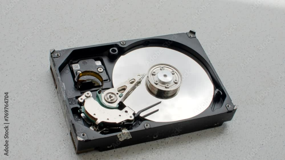 Close-up of a computer HD on a minimalist surface, ready to enhance its ...