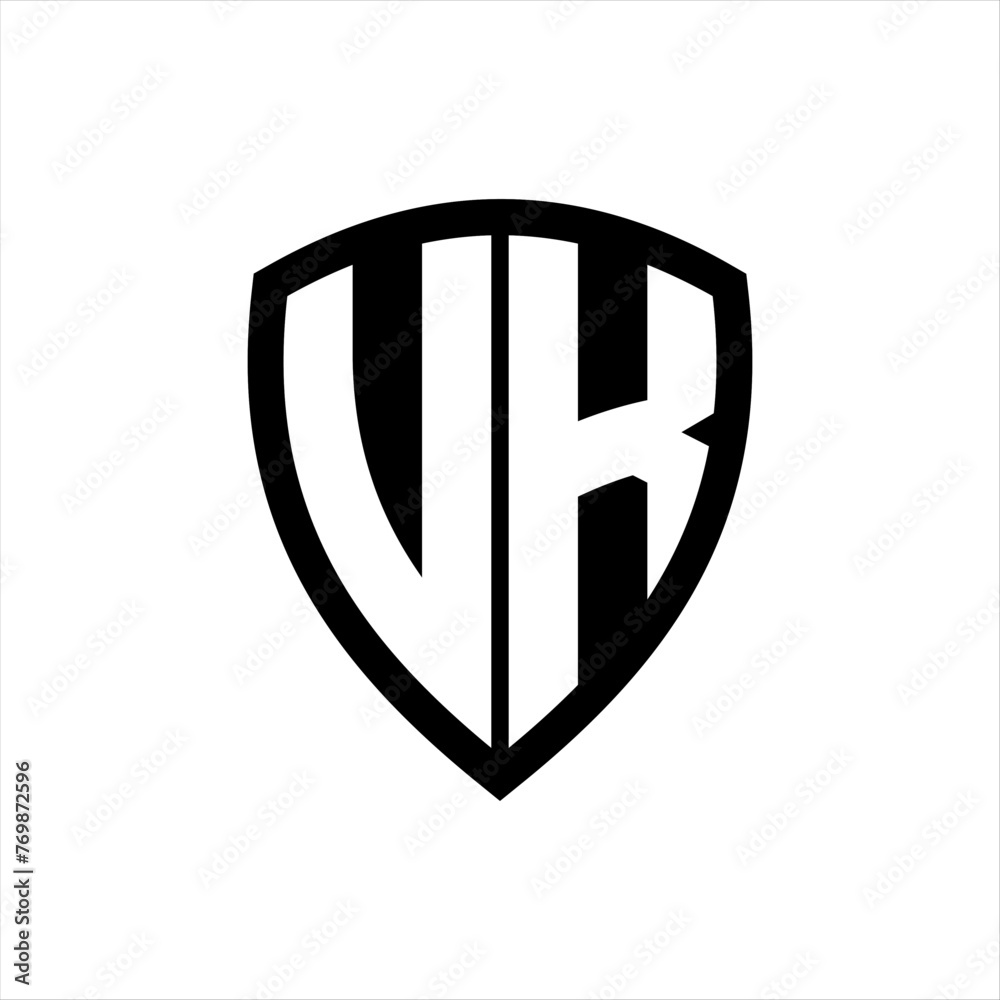 UK monogram logo with bold letters shield shape with black and white ...
