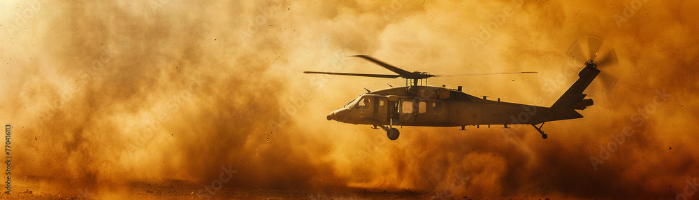 Amidst an intense operation, a military helicopter emerges through dust ...