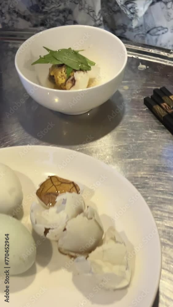 Egg with embryo Vietnamese delicacy. Balut boiled developing duck ...