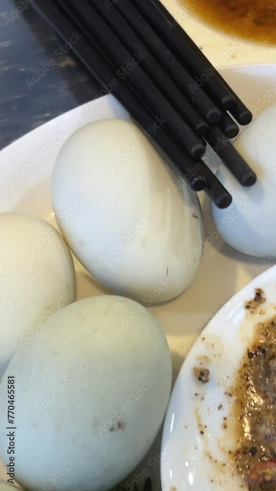 Egg with embryo Vietnamese delicacy. Balut boiled developing duck ...