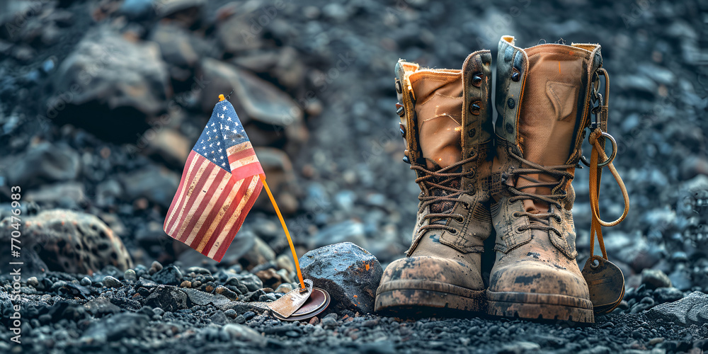 Old military combat boots with dog tags and two small American flags ...