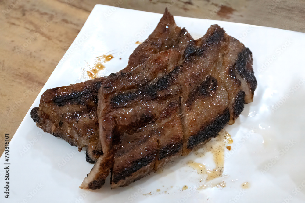 Liempo, grilled pork belly, one of the traditional food that can be ...
