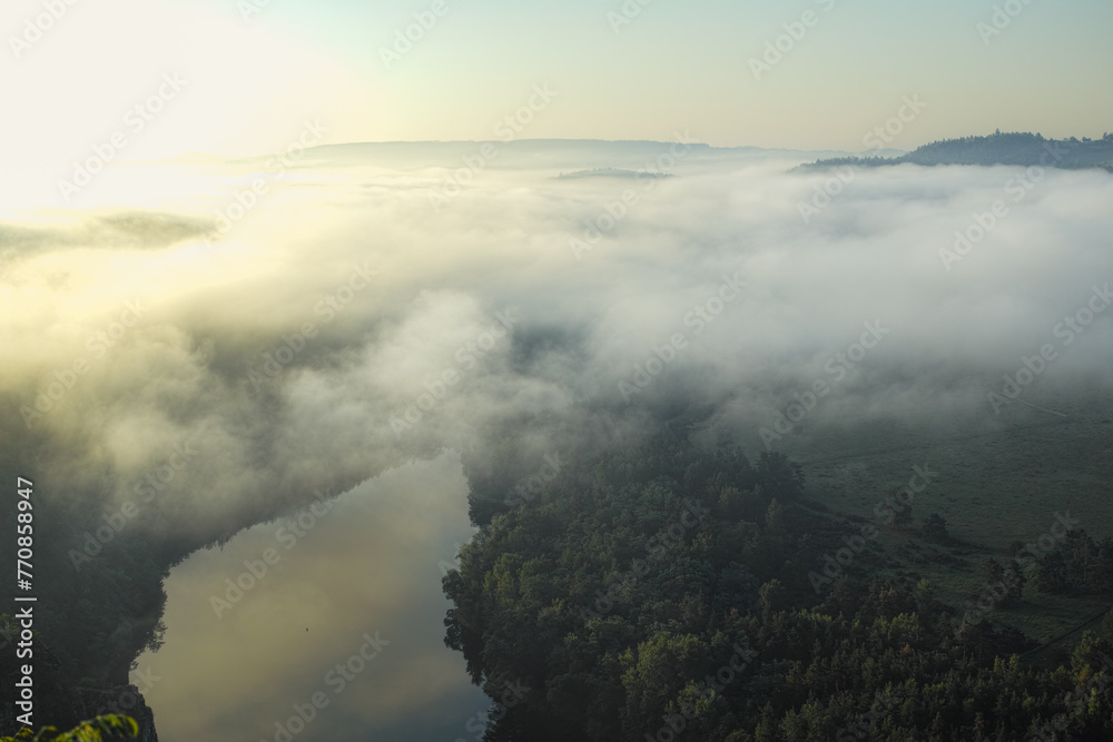 Sunset at Vltava river or Moldau river meandering through romantic ...