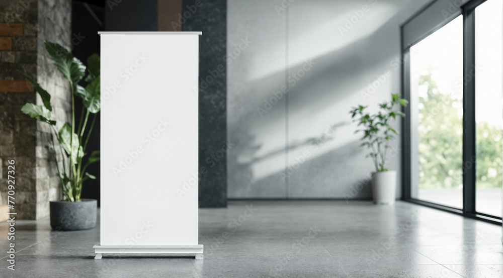 White roll-up banner template standing in lobby next to windows. Blank ...