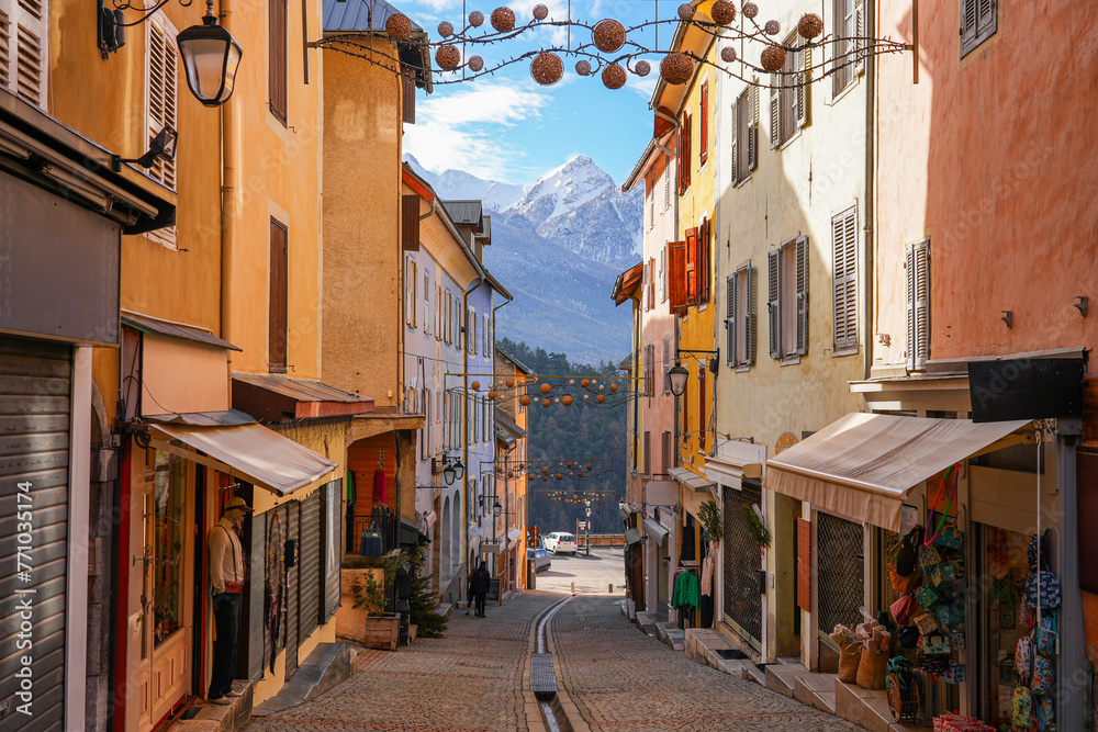 Grande Rue ("Main Street") shopping street flanked with colorful houses ...
