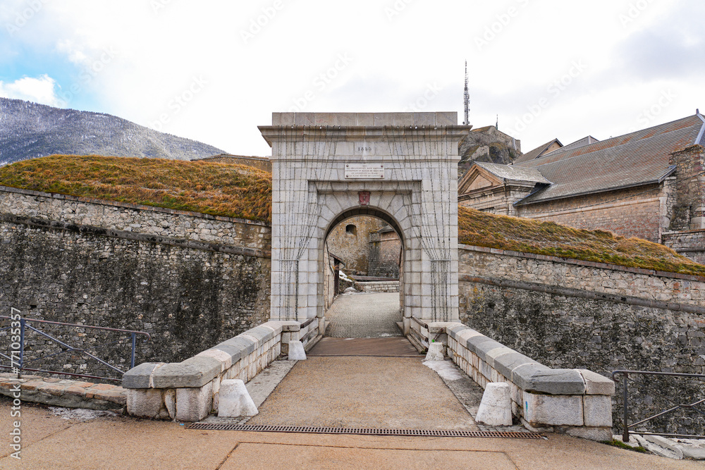 Gate of Pignerol in the fortified wall of Briançon, a city built by ...
