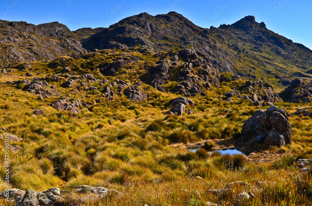 Rocky peaks towering above the boulder-filled high plateau of Itatiaia ...