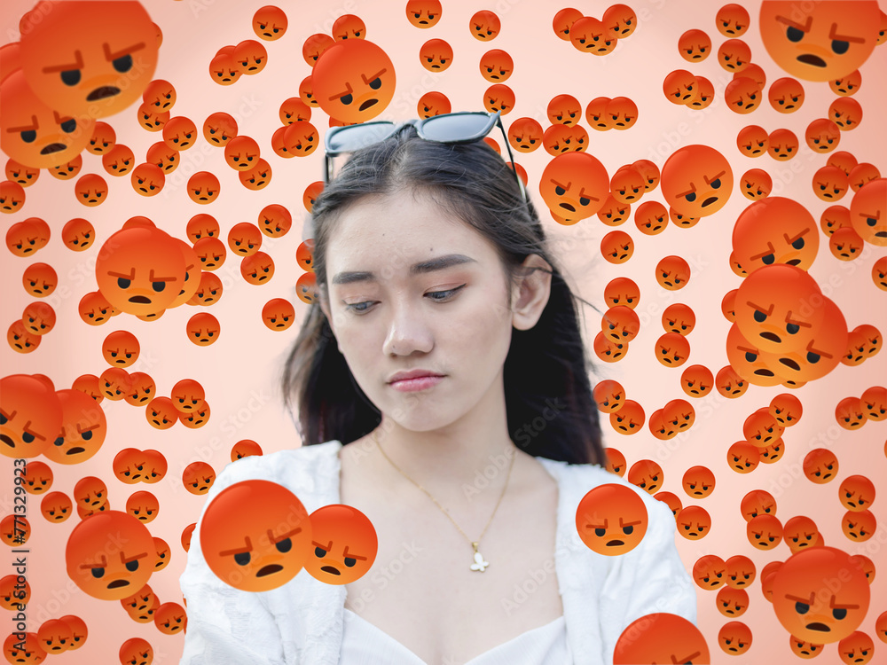 A woman appears distressed by numerous negative social media reacts and ...