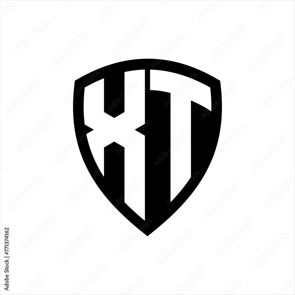 XT monogram logo with bold letters shield shape with black and white color design Stock Vector ...