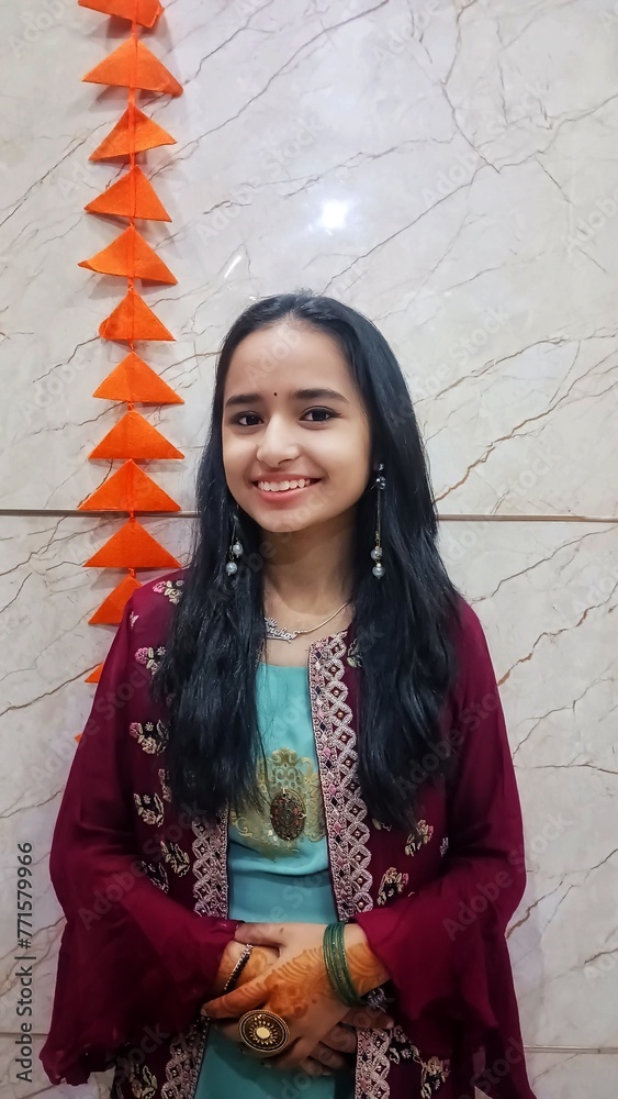 Indian teenage girl model in ethnic traditional dress in a festival ...