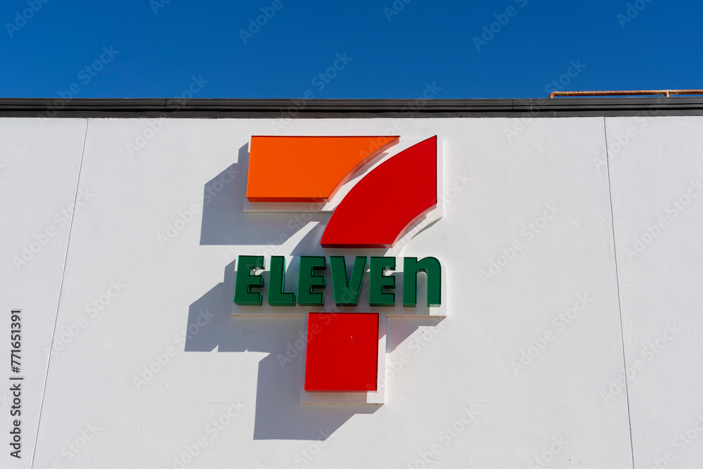Houston, Texas, USA - March 13, 2022: 7-Eleven logo sign on the wall is shown at one of their ...