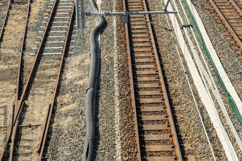 Abstract industrial background featuring detail of electrical railroad ...