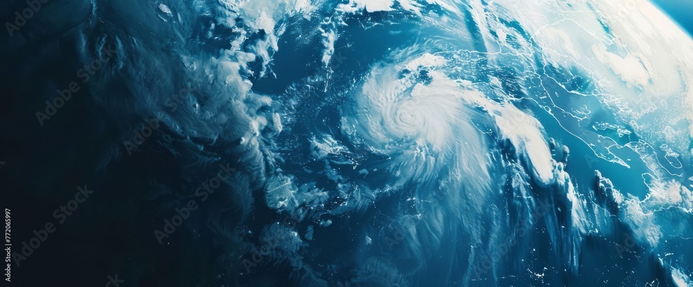 A massive hurricane is visible in the sky with the earth in sight ...