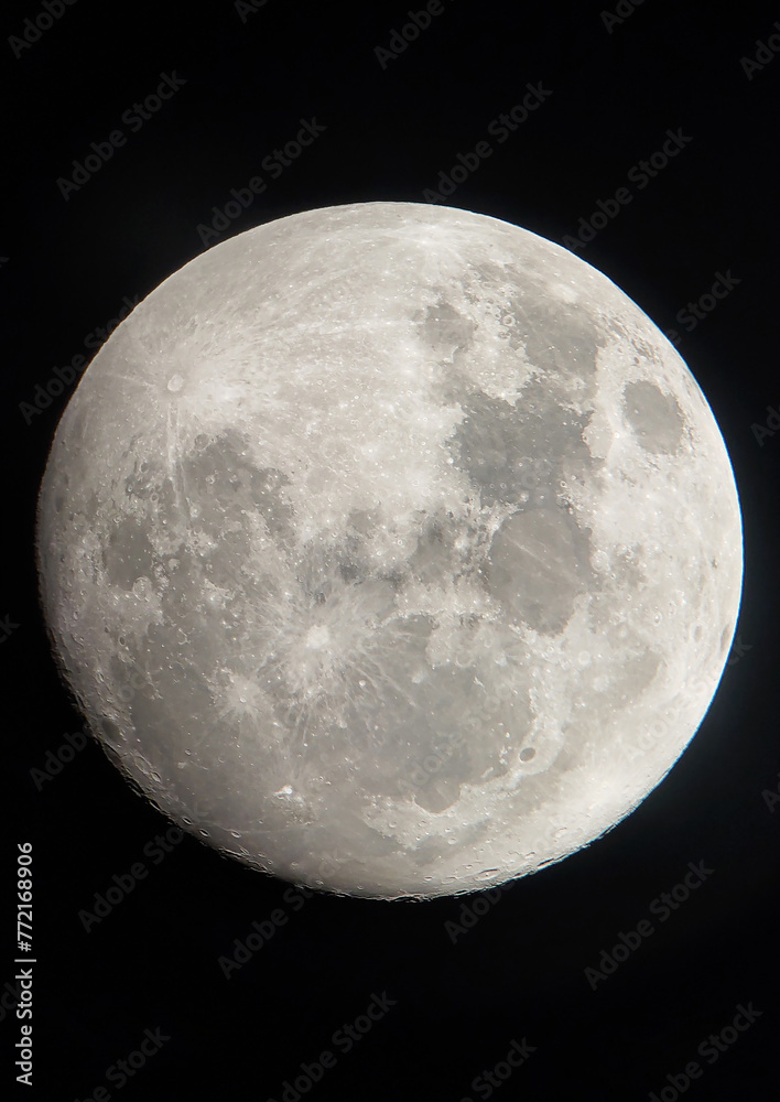 A high-resolution picture of the bright full moon shines in the dark ...