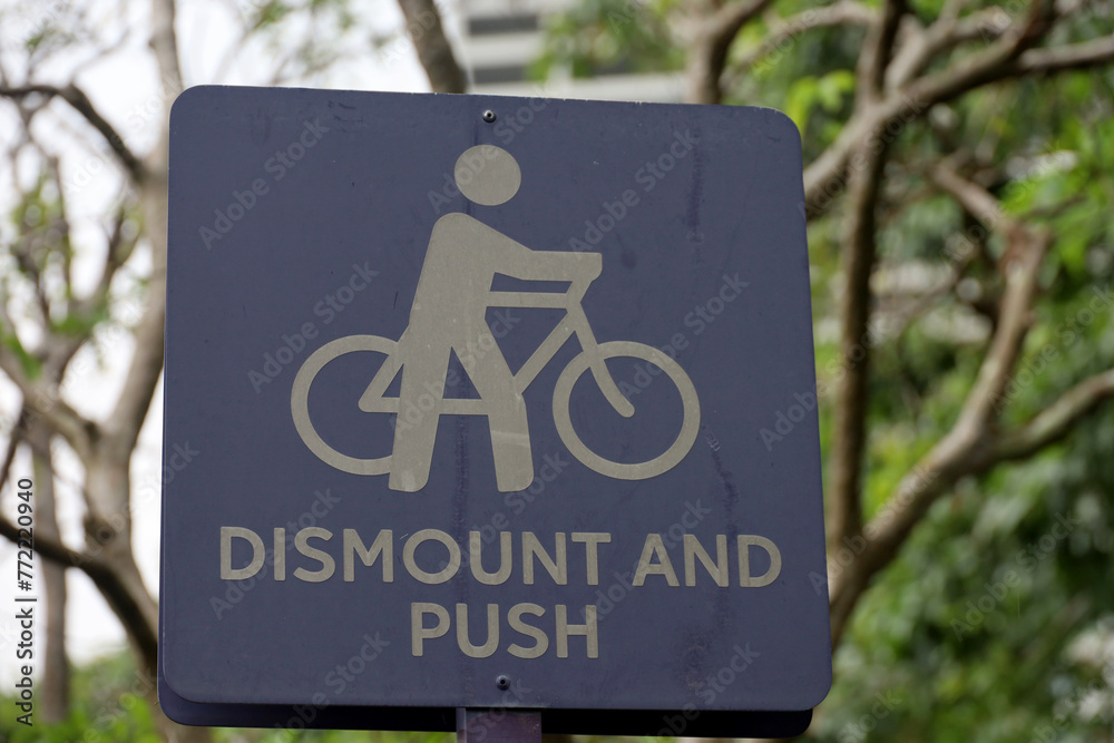 Poster dismount and push signs in the botanic garden area in Singapore ...