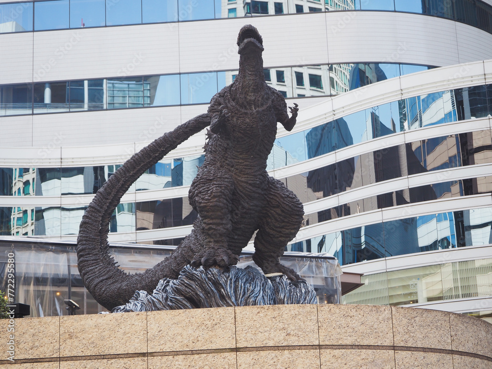 TOKYO, JAPAN - March 31, 2024: A statue of Godzilla in Godzilla Square ...