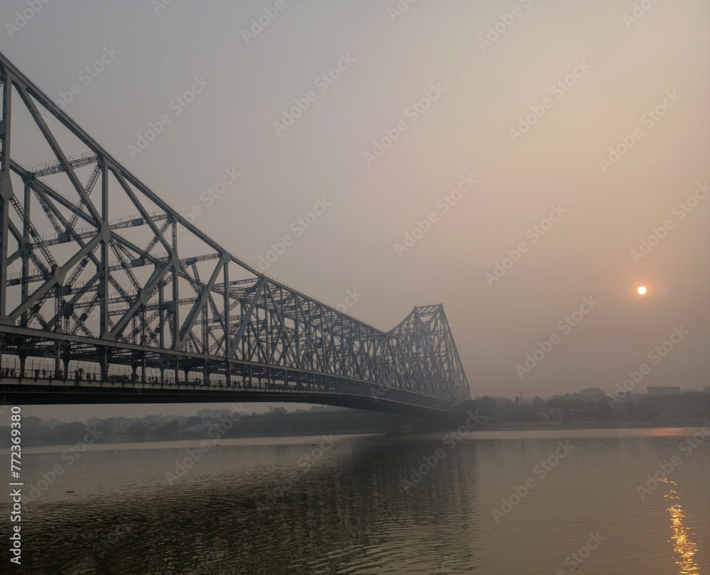 Kolkata, India, feb 26,2024: Historic Howrah bridge Kolkata at sunrise ...