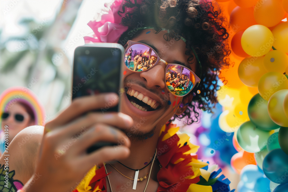 LGBT person using the phone during pride parade, gay african-american ...