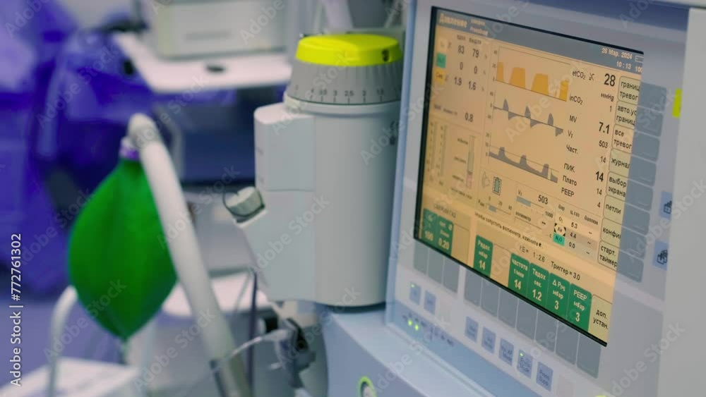 Monitor in a modern operating room to track the patient's vital signs ...