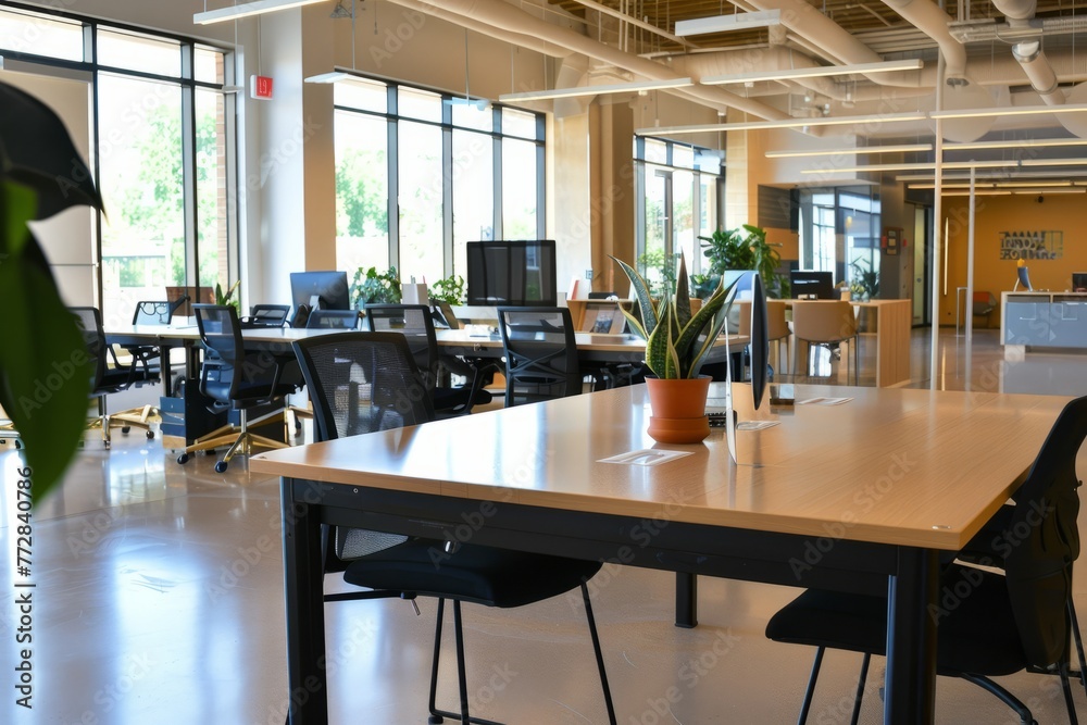 A collaborative work desk in a coworking space, with shared work ...