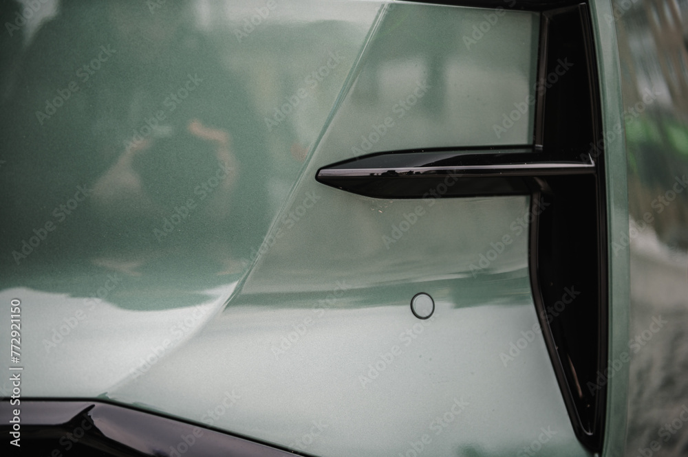 Parktronic on the rear bumper. Parking sensor on new modern electric ...