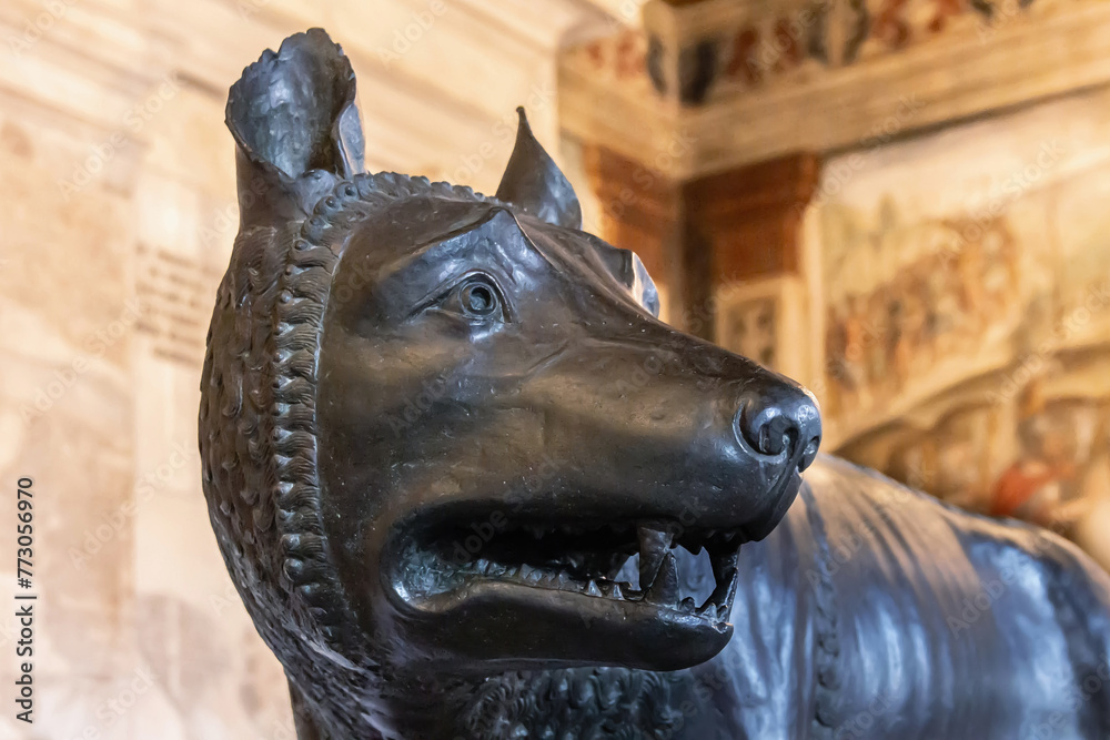 Capitoline wolf bronze sculpture. Mother-wolf feeding Romulus and Remus ...
