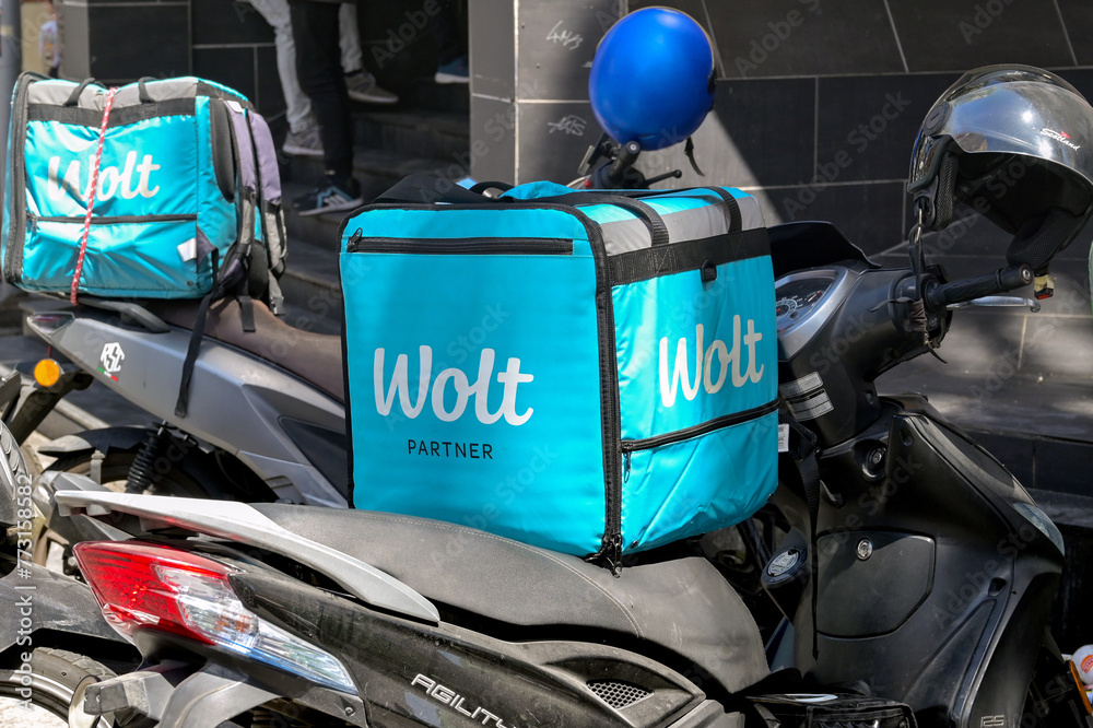 St Julians, Malta - 6 August 2023: Insulated containers for the Wolt takeaway food delivery ...