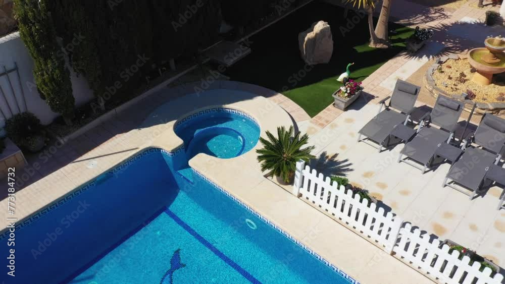 Aerial drone footage of a beautiful house in the town of Benidorm in ...
