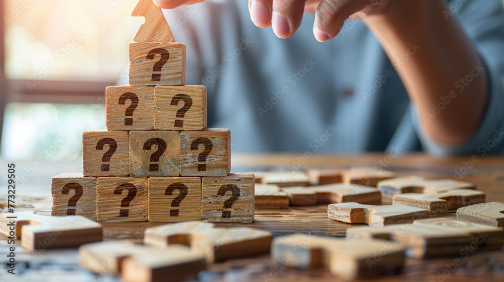 A hand delicately adds the last piece, marked with an idea icon, to a ...