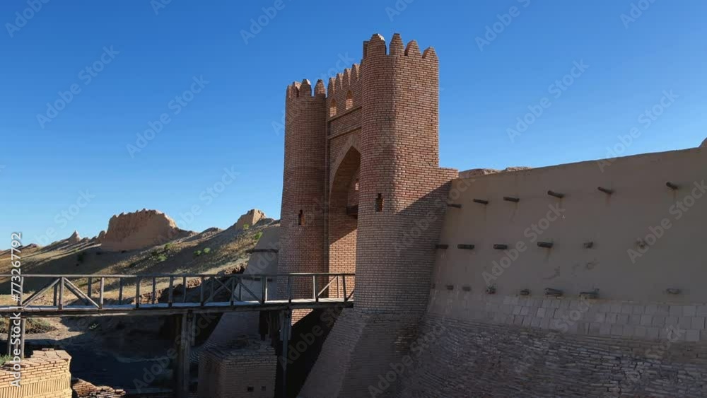 Turkestan walls of the ancient city of Sauran on a sunny day with a ...