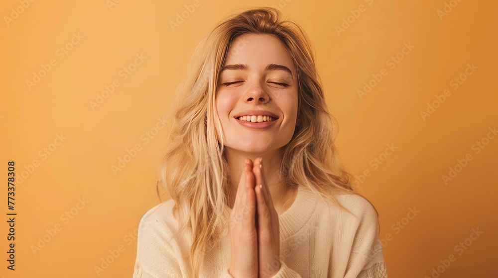 Portrait happy smiling pretty young blonde woman clapping hands an ...